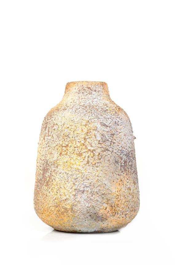 Rustic Ceramic Vase with a Rough Textured Surface and Earthy Tones ...