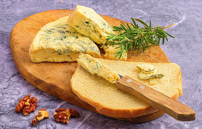 Rustic Charm: Blue Cheese with Bread, Walnuts, and Rosemary on Marble ...