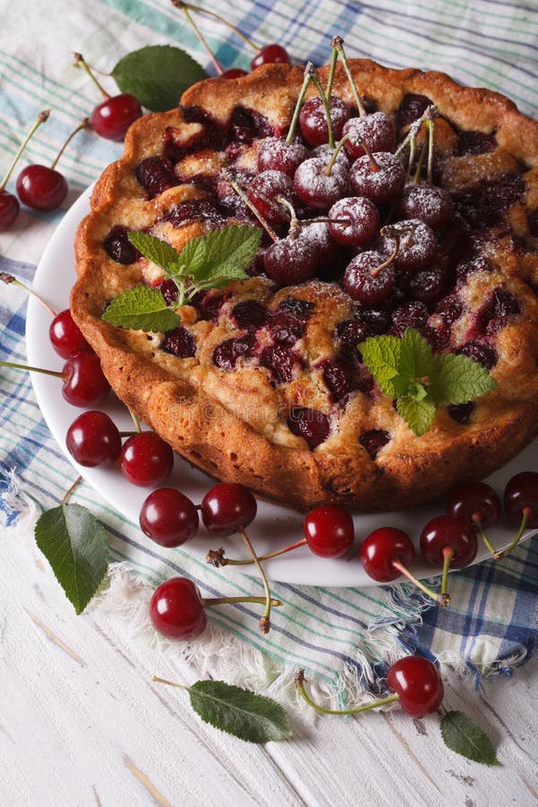 Rustic Cherry Pie Close Up on a Plate on the Table. Vertical Stock ...