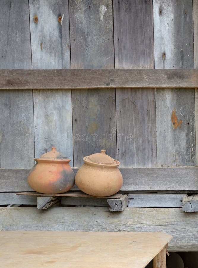 Rustic Clay Pots with a Wooden Handle Stock Image - Image of ancient ...