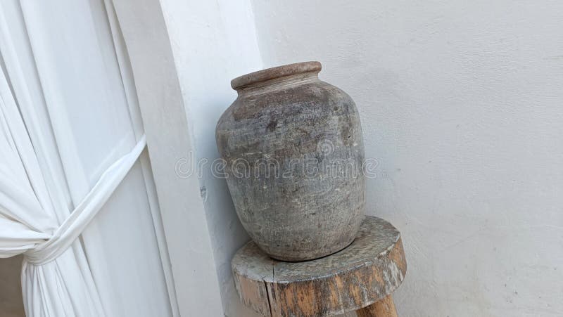 Rustic Clay Vase on Wooden Stool in Cozy Niche Stock Photo - Image of ...