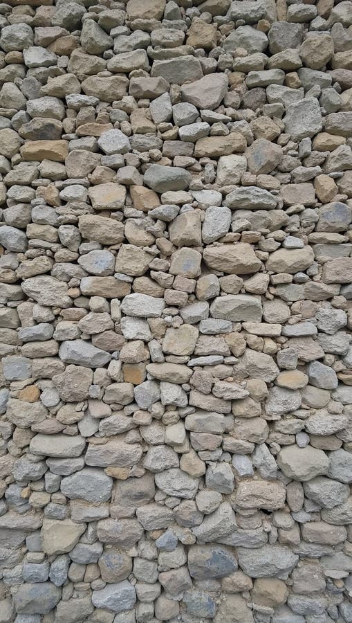 Rustic Cobblestone Wall with Rounded Gray and Brown Stones Stock ...