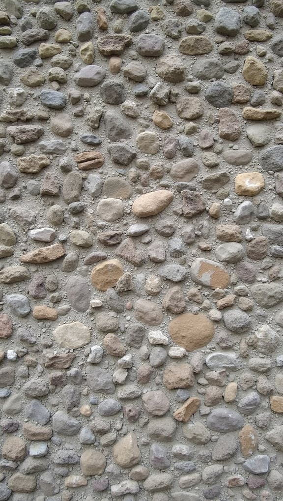 Rustic Cobblestone Wall with Rounded Gray and Brown Stones Stock ...