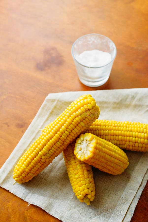 Rustic Concept Just Cooked Corn with Salt on Table Stock Photo - Image ...