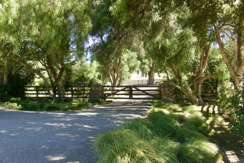 Ranch Gate Over the Property Entrance Stock Image - Image of trees ...