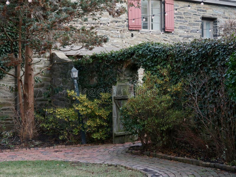 Rustic Courtyard and Garden Path Stock Photo - Image of hanging, stone ...