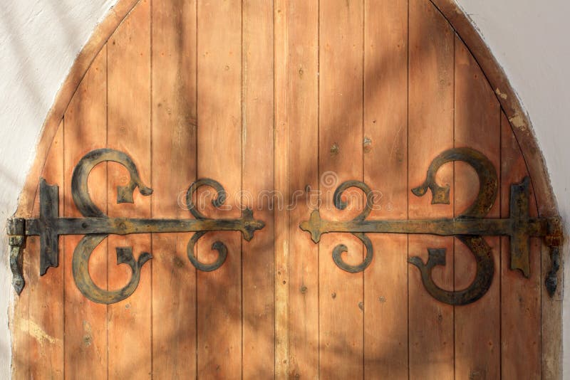 Rustic Metal Hinges on Old Wooden Doors. Stock Image - Image of ...