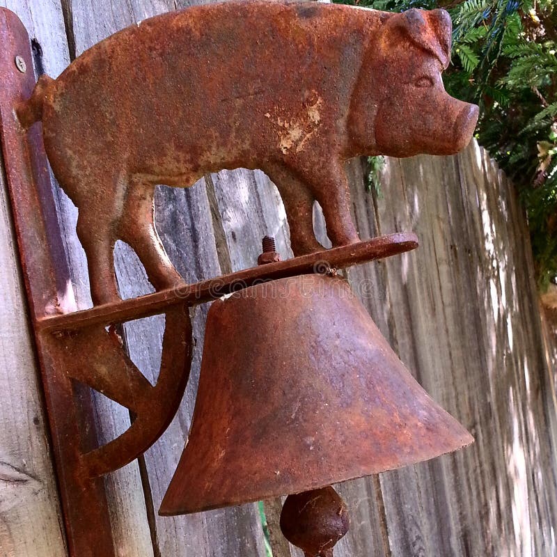 Rustic Dinner Bell stock image. Image of porky, rustic - 46655041