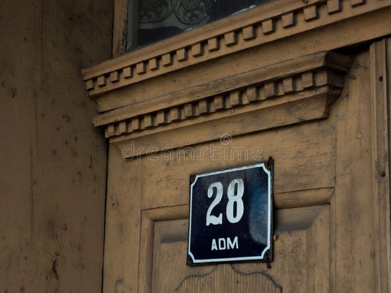 Rustic Door with Number 28 Sign in Poland Stock Photo - Image of symbol ...