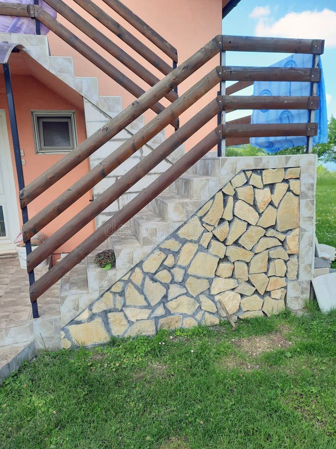 Rustic Earth-colored Stones Glued To a Decorative Wall.gluing Stone To ...