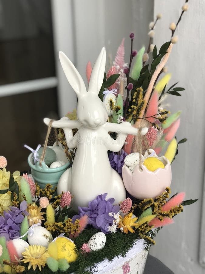 Rustic Easter Composition with a Decorative White Ceramic Bunny Pastel ...
