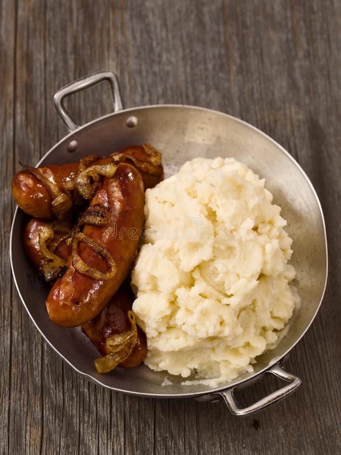 Rustic english pub grub bangers and mash - Stock Image - Everypixel