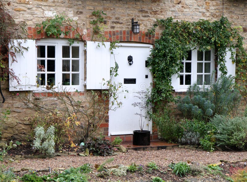 Rustic English Village Cottage Stock Image - Image of shutters ...
