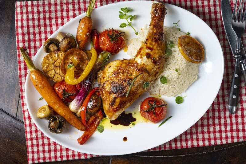 Rustic Fried Chicken Legs with Assorted Vegetables and Rice Stock Image ...