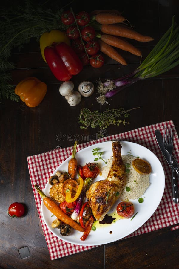 Rustic Fried Chicken Legs with Assorted Vegetables and Rice Stock Image ...