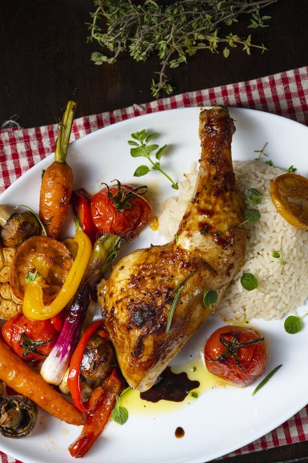 Rustic Fried Chicken Legs with Assorted Vegetables and Rice Stock Image ...