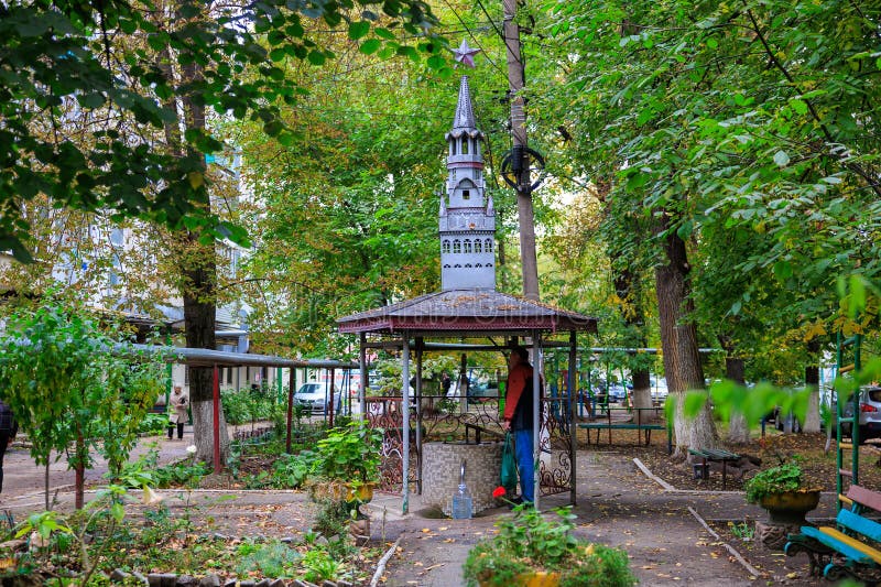 Rustic Gazebo in Park with Model Tower and Lush Greenery. October 20 ...