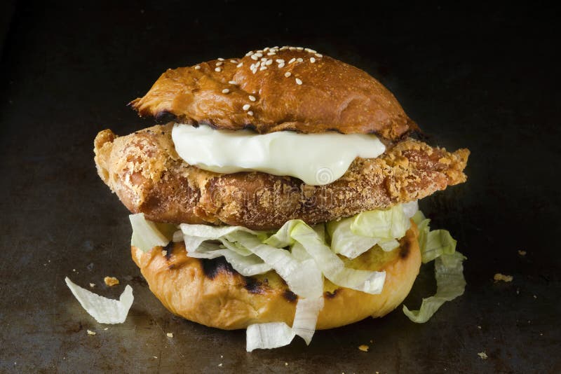 Rustic Golden Chicken Burger Stock Image - Image of color, cholesterol ...