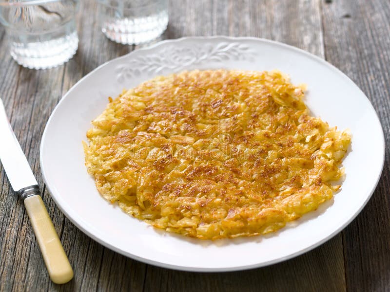 Rustic Golden Crispy Swiss Rosti Stock Image - Image of grated, roschti ...