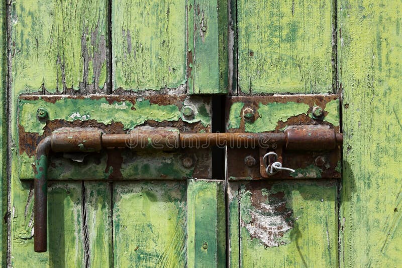 Rustic Green and Rusty Hasp Holding an Old Wooden Door Stock Photo ...