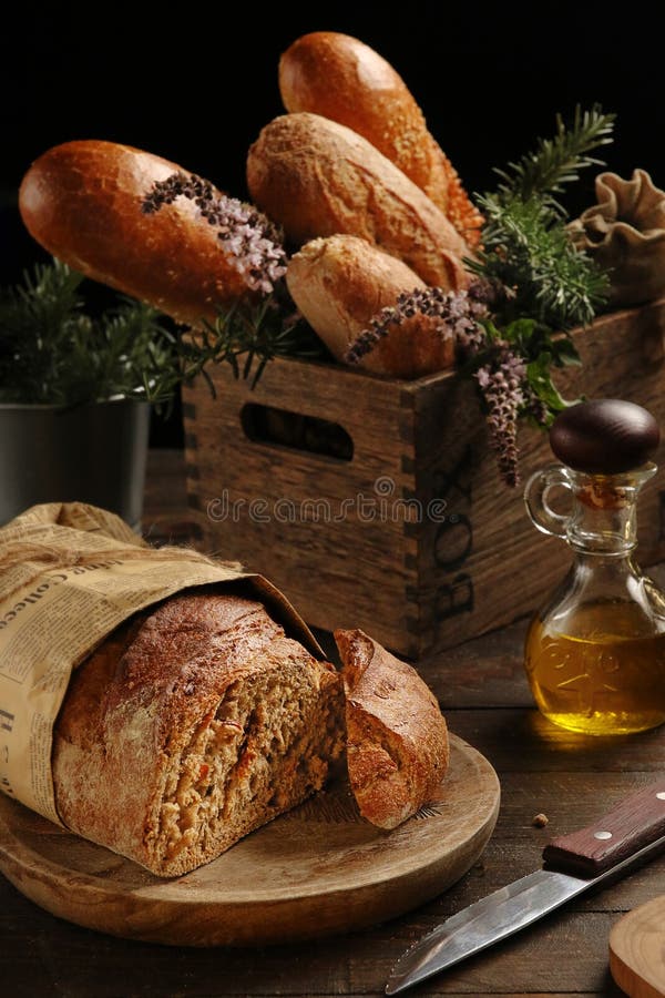 Rustic Handmade Bread on a Wooden Table Stock Photo - Image of crispy ...