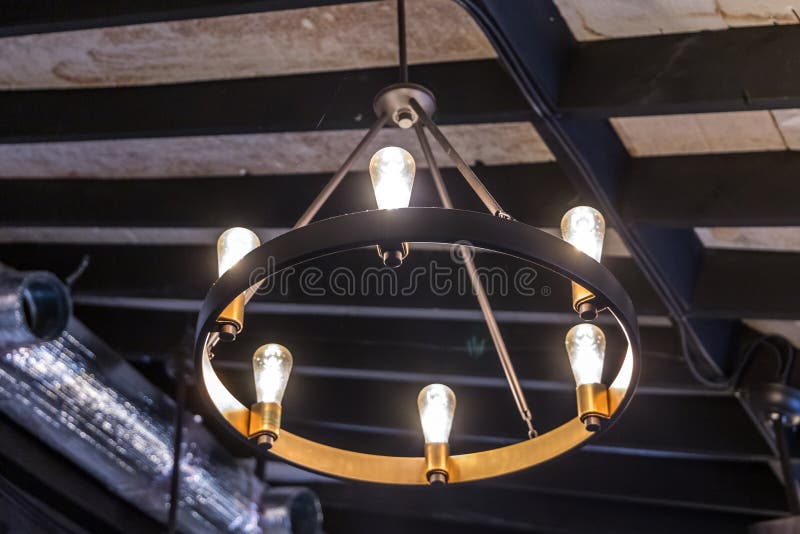 A Rustic Hanging Mid-evil Type Light Fixture or Lantern Hung from a ...