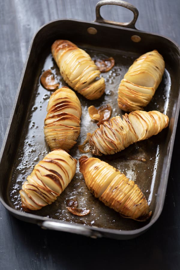 Rustic Hasselback Baked Potatoes Stock Image - Image of potato, rustic ...
