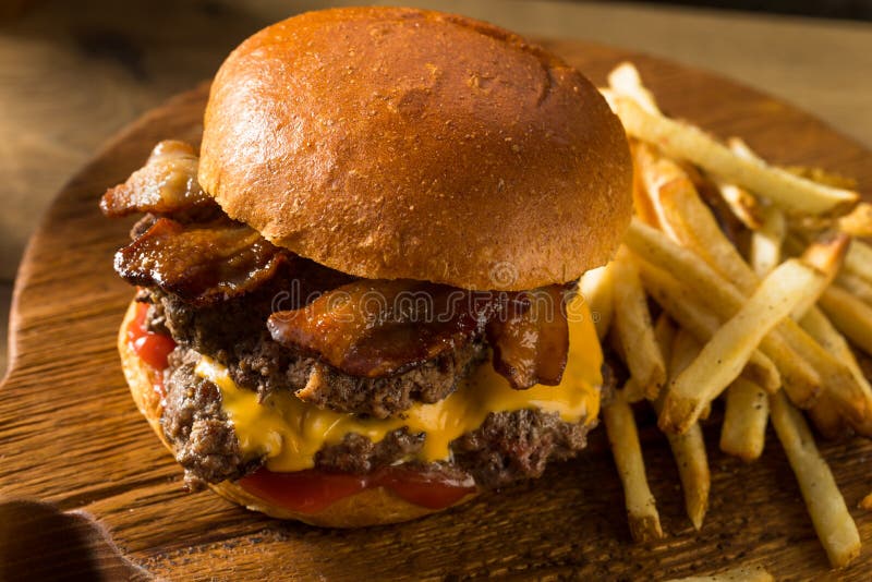 Rustic Homemade Bacon Smashburger Stock Photo - Image of cheeseburger ...