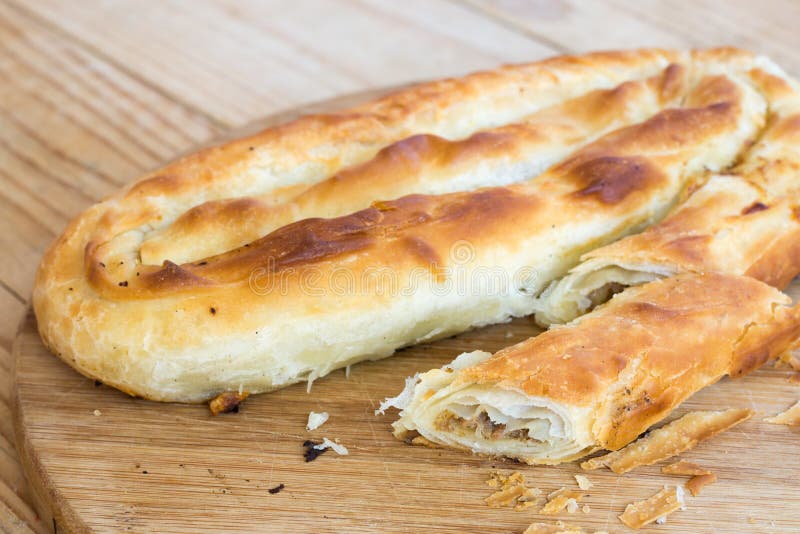 Rustic Homemade Burek Pie with Meat on the Wooden Background Stock ...