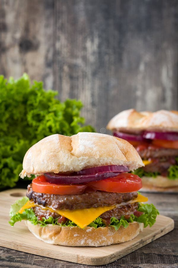 Rustic Homemade Burger on Wood Stock Photo - Image of food, homemade ...