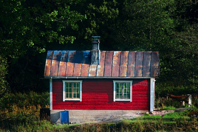 Rustic House with a Rusty Roof on the Edge of the Forest Stock Image ...