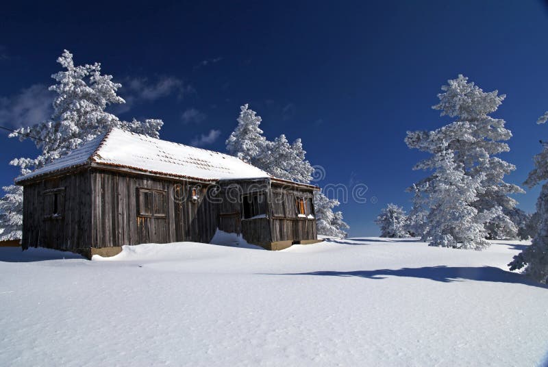 Rustic house in snow stock image. Image of seasons, sunshine - 7162845