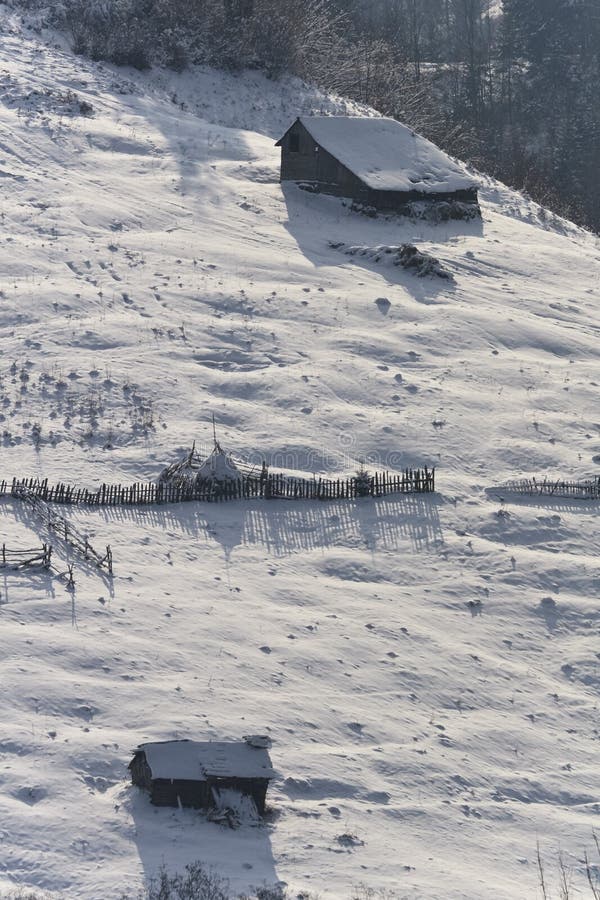 Rustic houses in winter stock image. Image of countryside - 17086733