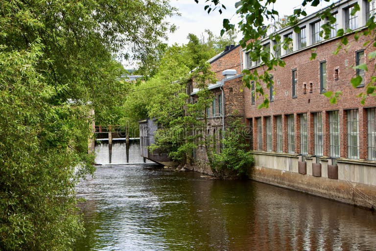 Rustic Industrial Buildings with Waterfall Stock Image - Image of ...