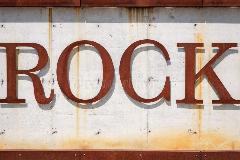 Rustic Iron Lettering on Concrete Wall Texture Stock Image - Image of ...