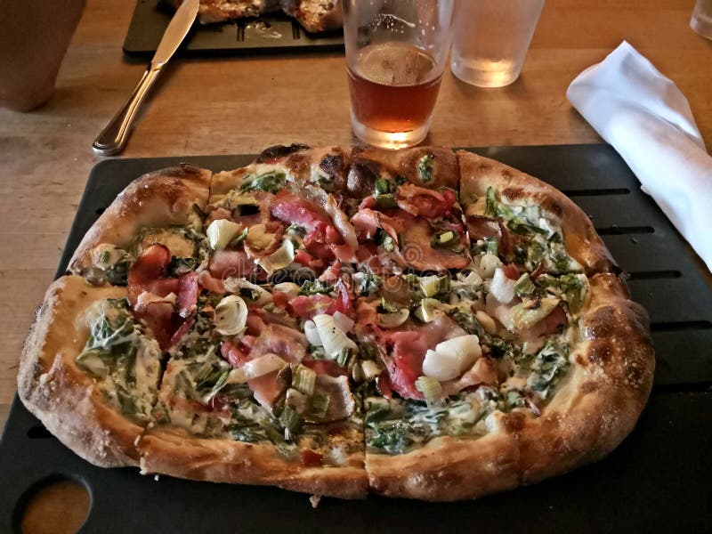 Rustic Italian Pizza with Mozzarella and Bacon Stock Photo - Image of ...