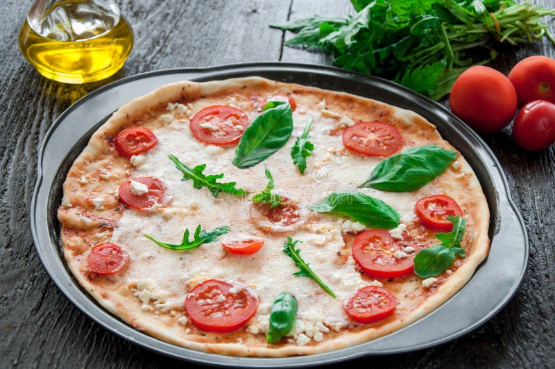 Rustic Italian Pizza with Mozzarella, Cheese and Basil Stock Image ...