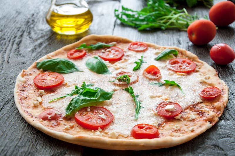 Rustic Italian Pizza with Mozzarella, Cheese and Basil Stock Image ...