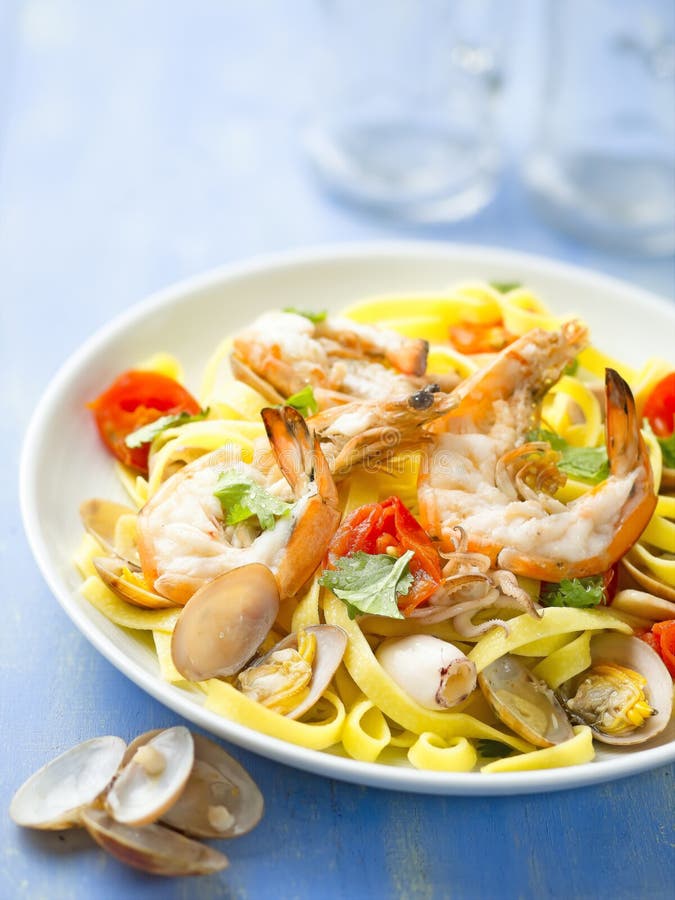 Rustic Italian Seafood Pasta Stock Image - Image of calamari, vertical ...