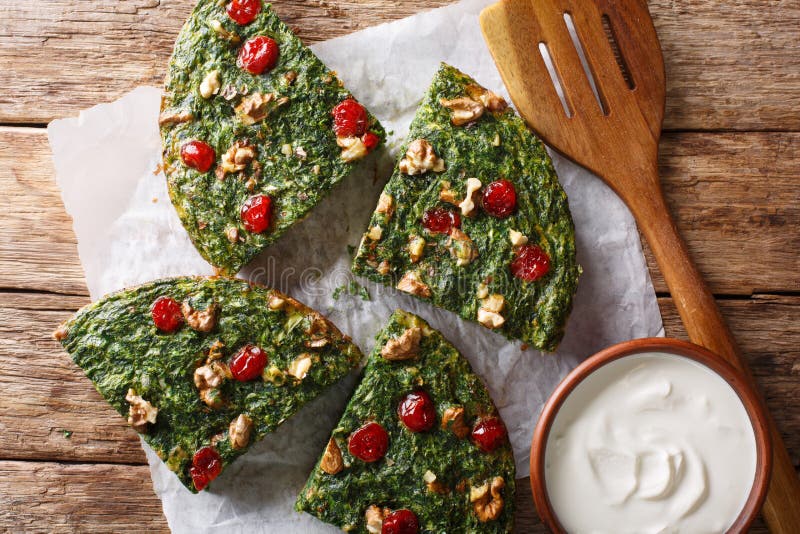 Persian Kuku Sabzi Omelette of Herbs, Eggs and Nuts Closeup. Horizontal ...