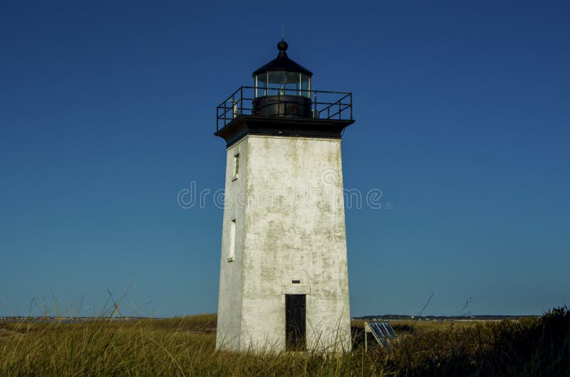 Rustic Lighthouse in Field stock image. Image of navigation - 63576375