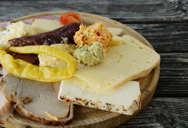 A Rustic Meal of Cheeses and Cold Cuts in the Austrian Alps of the ...
