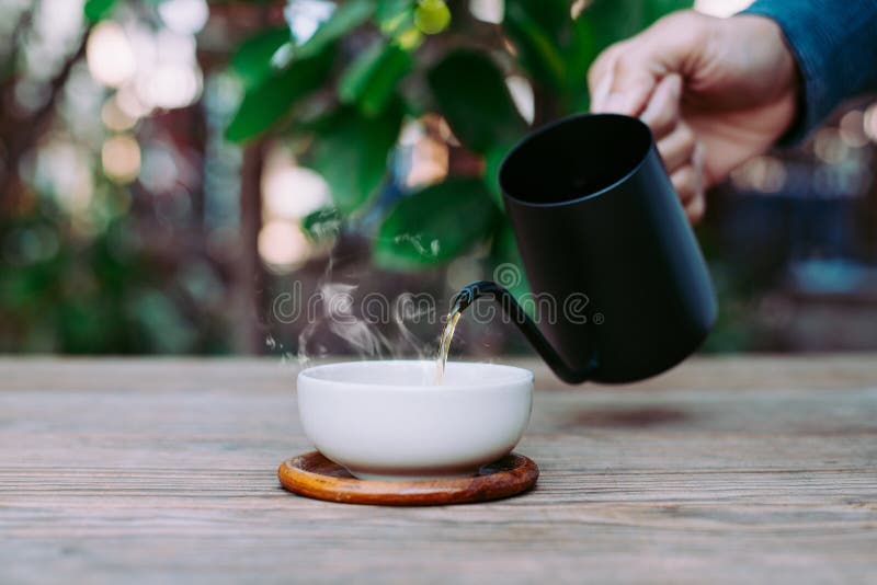 Rustic Morning Tea, Pouring Tea Onto the Teacup Stock Photo - Image of ...