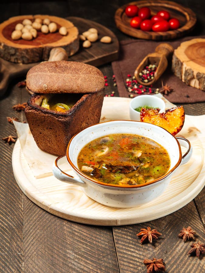 Rustic Mushroom Soup on Wooden Board with Bread Stock Photo - Image of ...