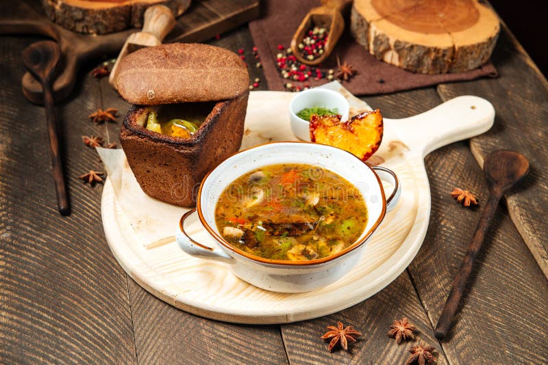 Rustic Mushroom Soup on Wooden Board with Bread Stock Image - Image of ...