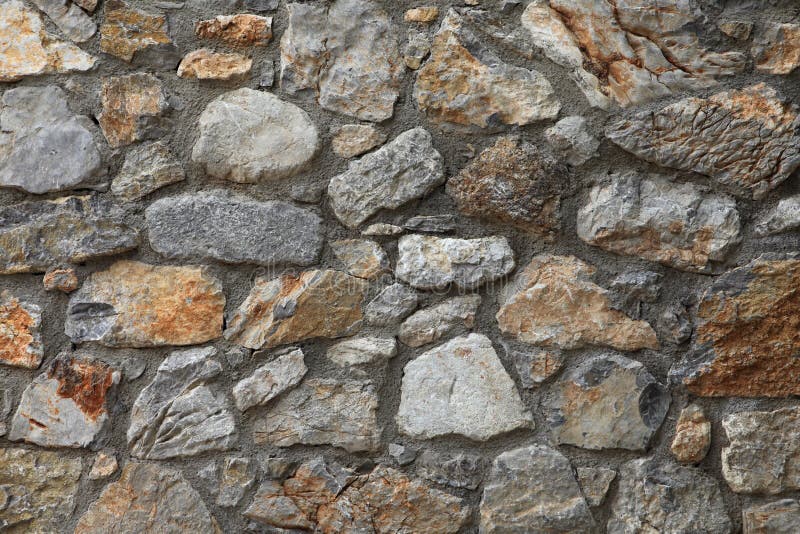 Rustic natural stone wall stock photo. Image of stones - 31907790
