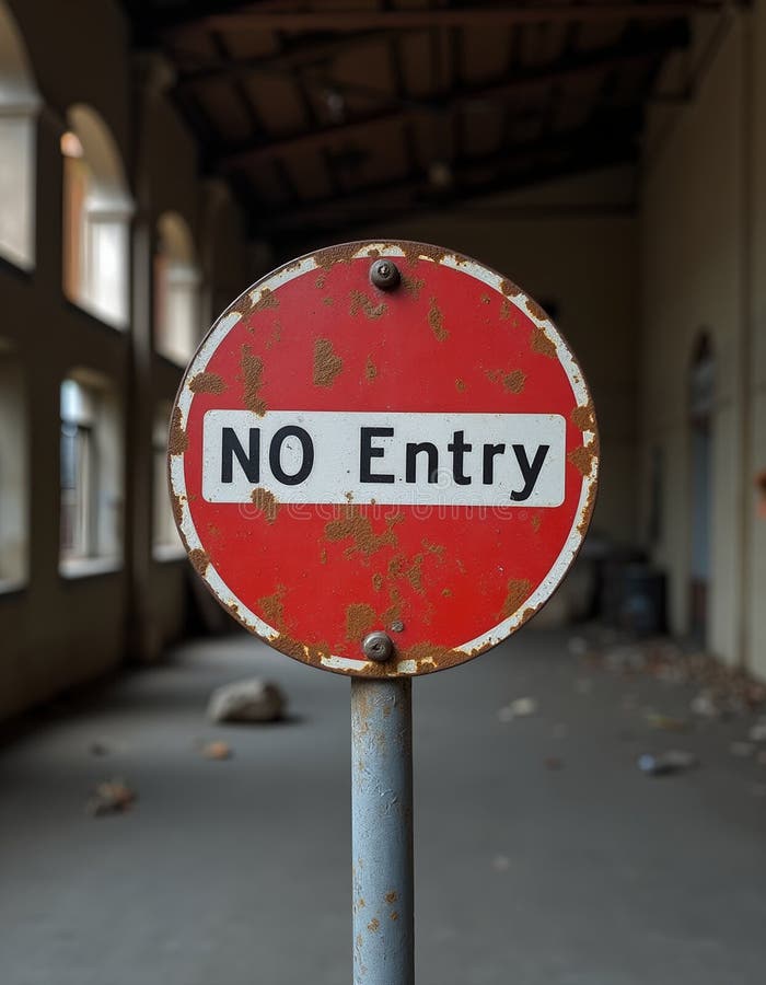 Rustic No Entry Metal Sign Against Deserted Warehouse Backdrop Stock ...