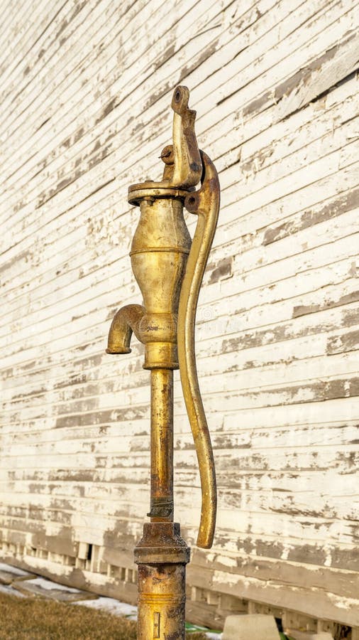 Rustic Old Water Pump and Old Building Stock Photo - Image of antique ...
