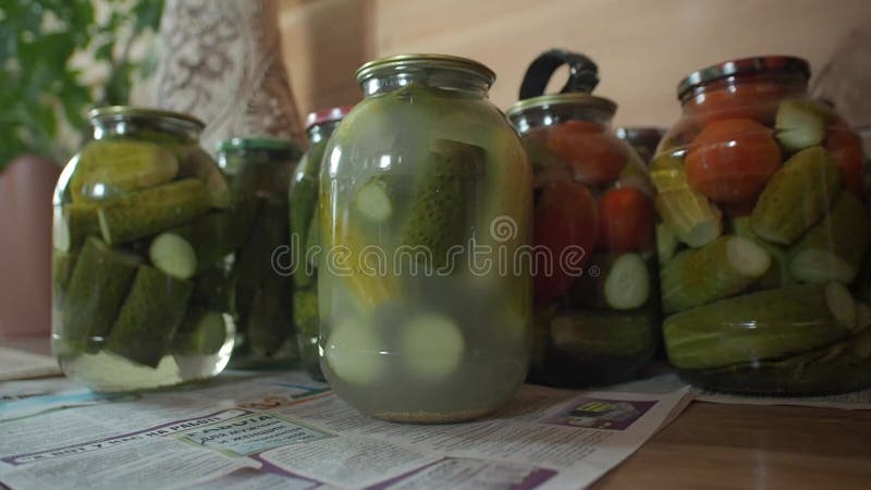 Rustic Pickles, Cucumbers and Tomatoes on the Shelf in Jars Stock Video ...