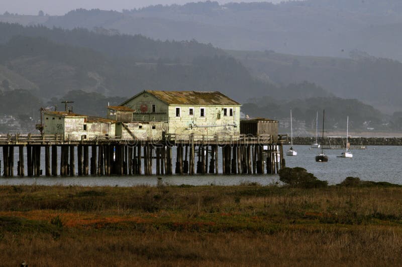 Rustic pier buildings stock image. Image of buildings - 50586547
